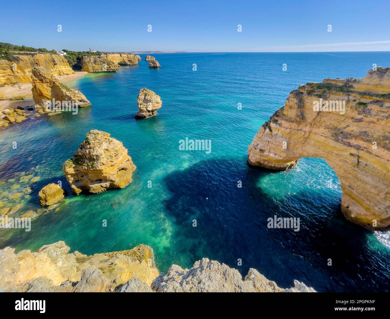 Beautiful cliffs and rock formations by the Atlantic Ocean at Marinha ...