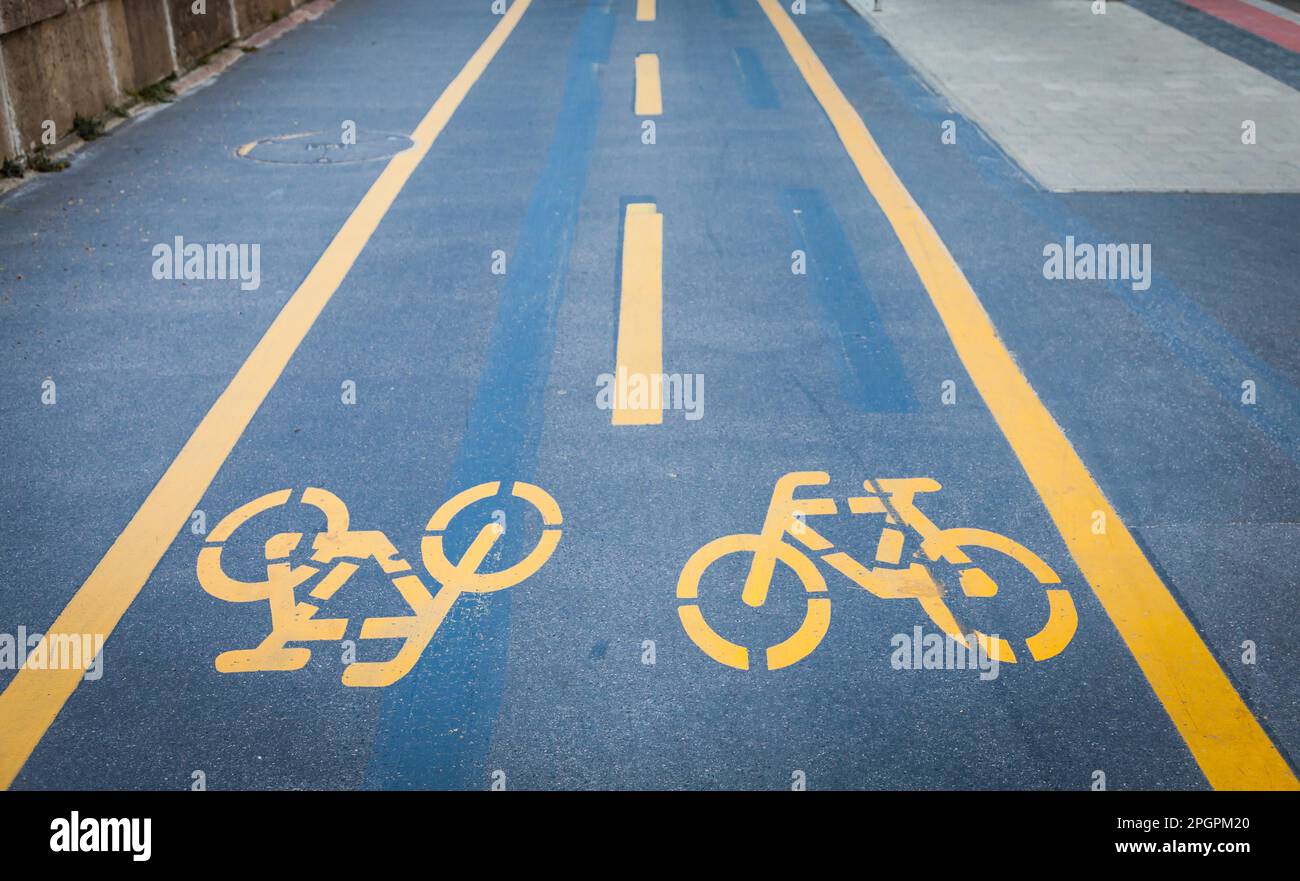 Bicycle signs painted on a dedicated street in Bucarest, Hungary Stock ...