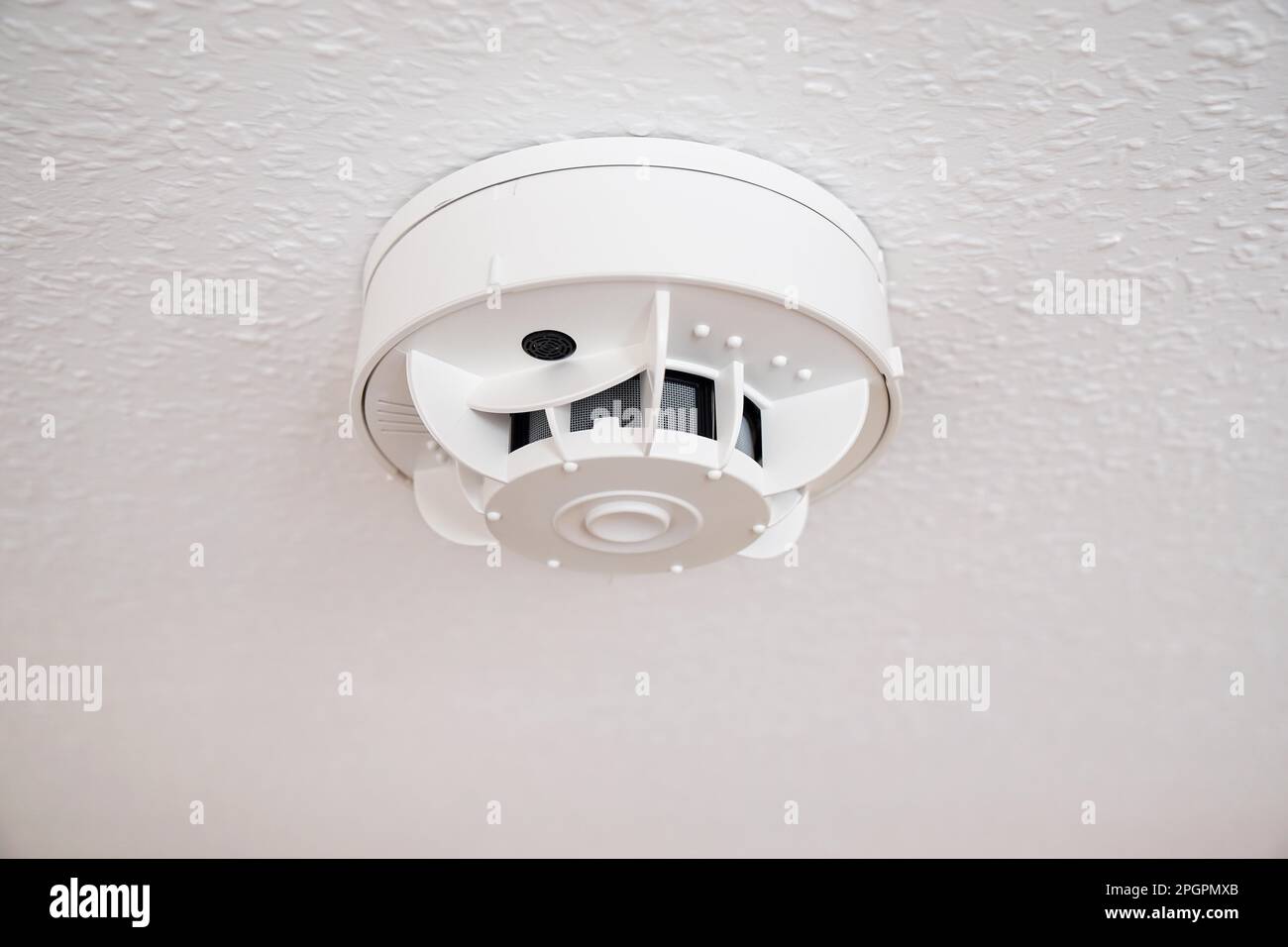 domestic smoke alarm or smoke detector at ceiling Stock Photo - Alamy
