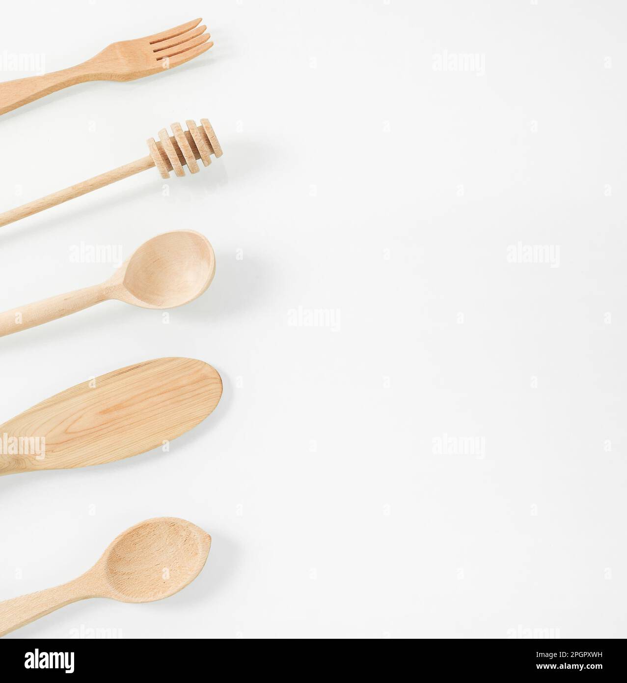 Wooden kitchen utensils. Various wooden kitchen tools arranged ...