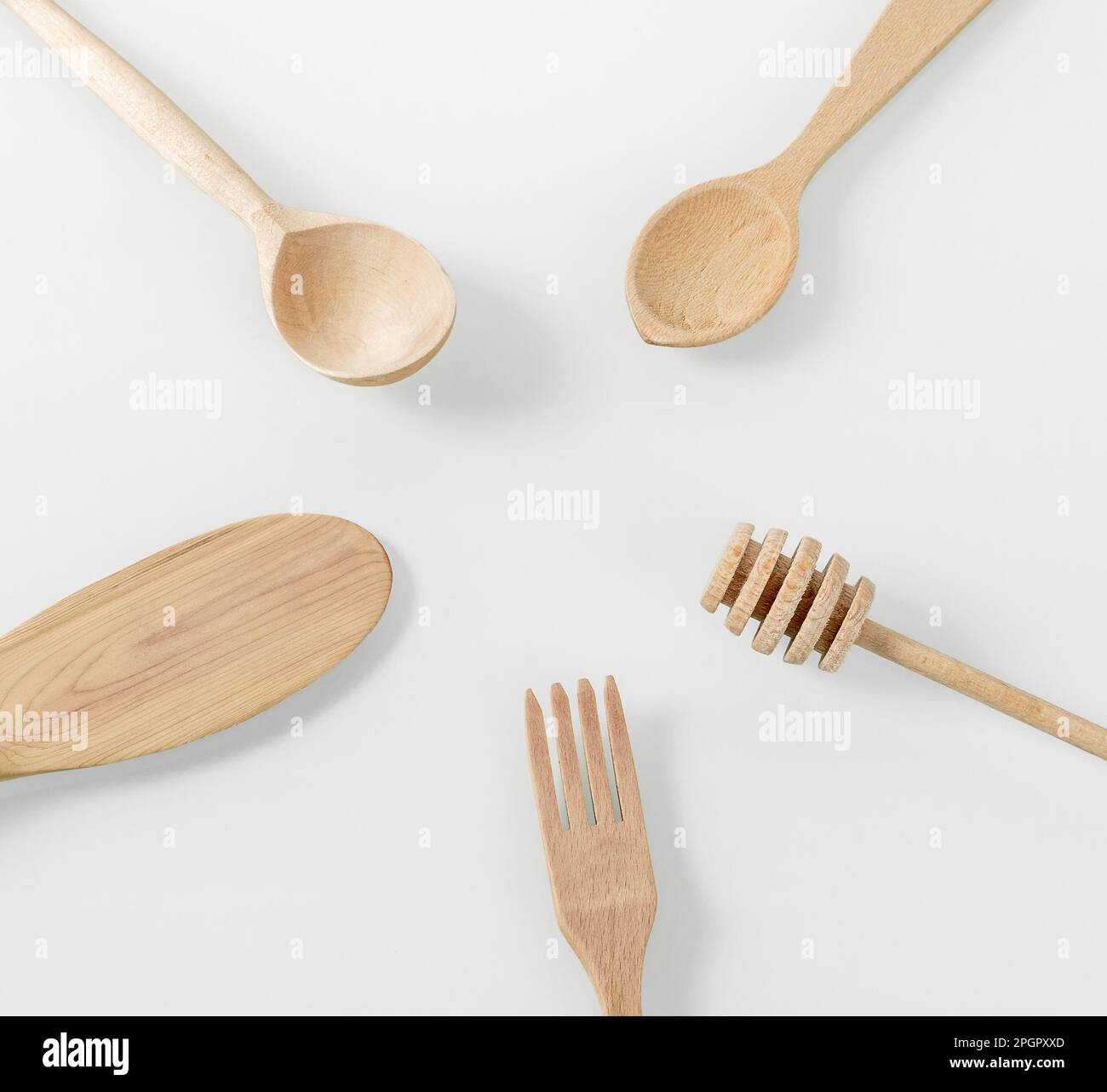 Wooden kitchen utensils. Various wooden kitchen tools are arranged in a ...