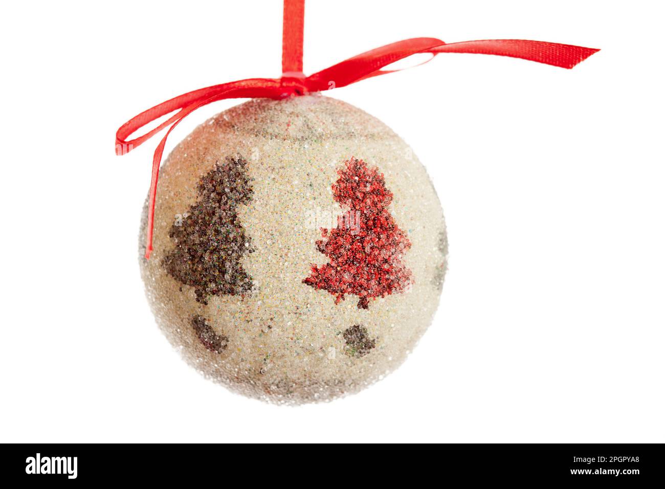 Christmas ball decoration with red ribbon isolated over white ...