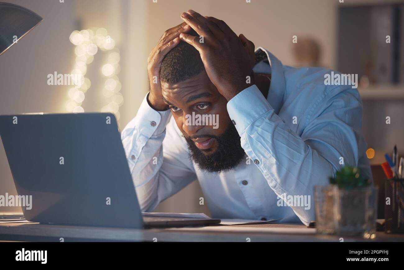 Stress, worry and black man on laptop at night working late on project ...