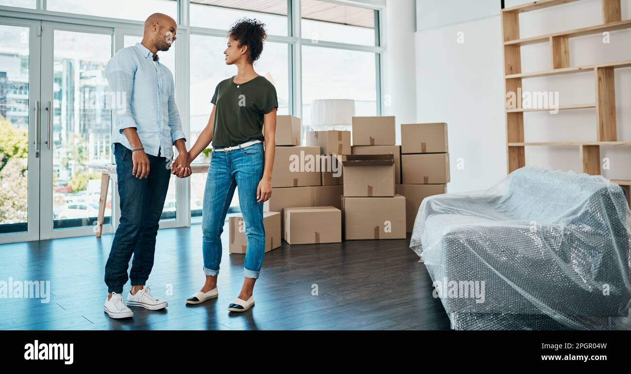 The best decision was moving in together. a young couple holding hands ...