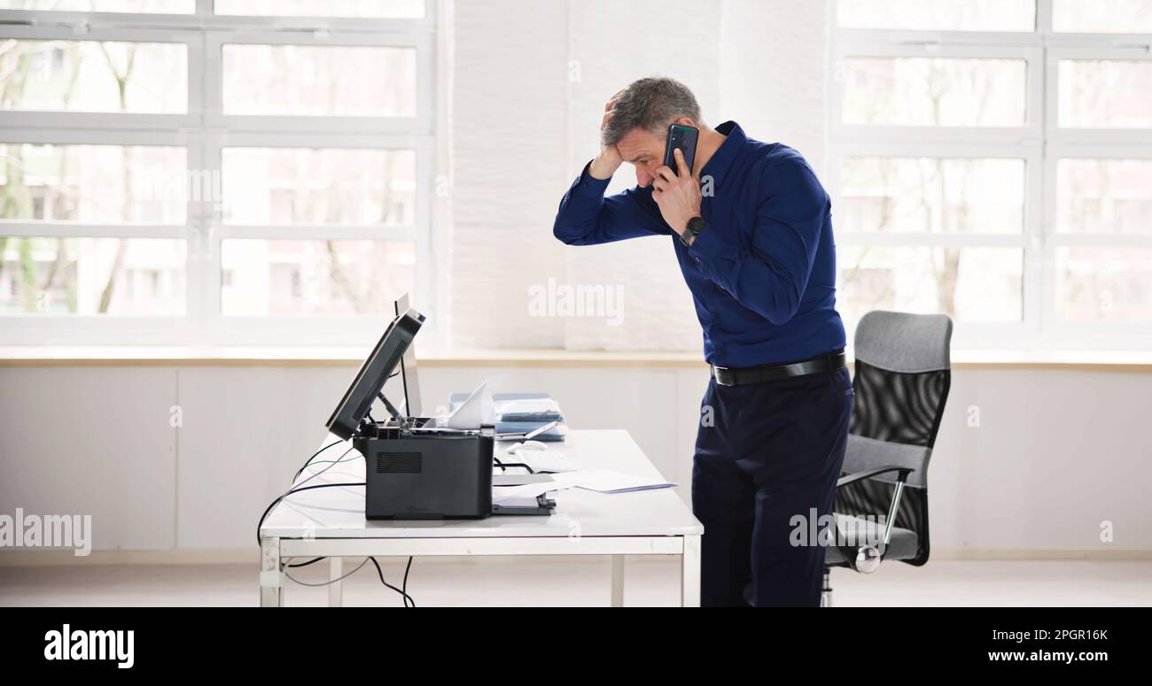 Annoyed By Broken Office Printer Toner Problem Stock Photo - Alamy