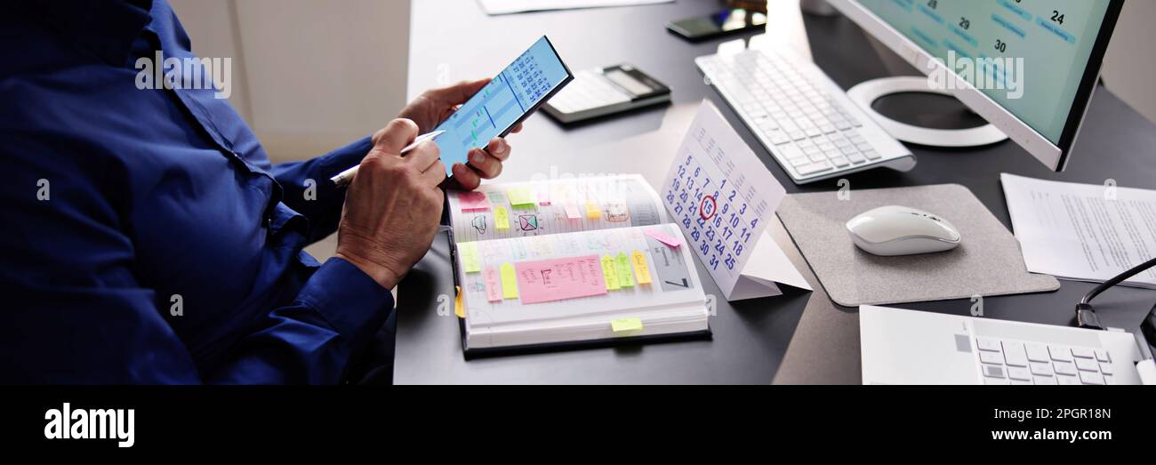 Calendar Schedule List At Desk And In Mobile Phone Stock Photo - Alamy