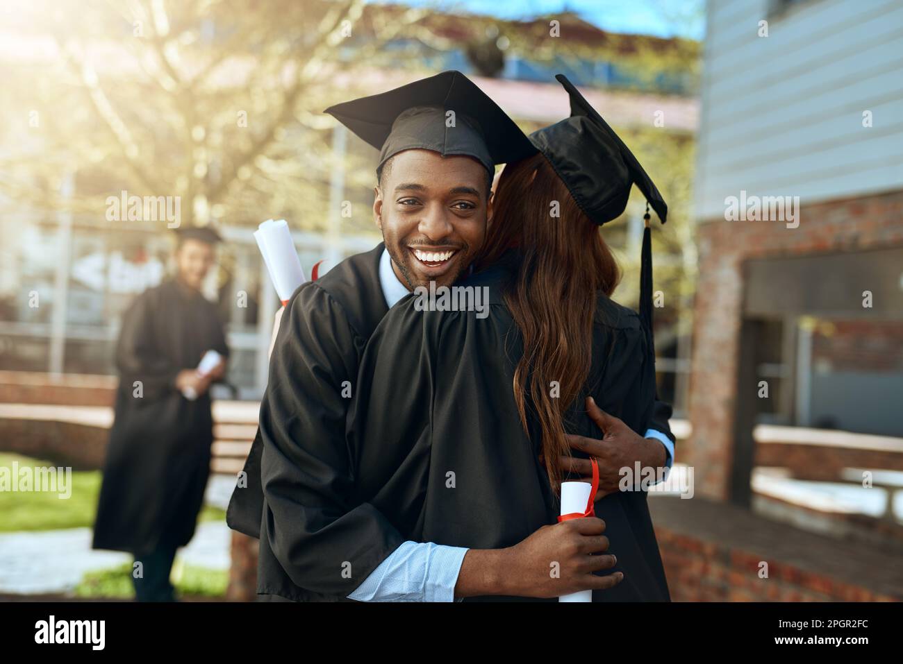 Two men hugging goals hi-res stock photography and images - Alamy