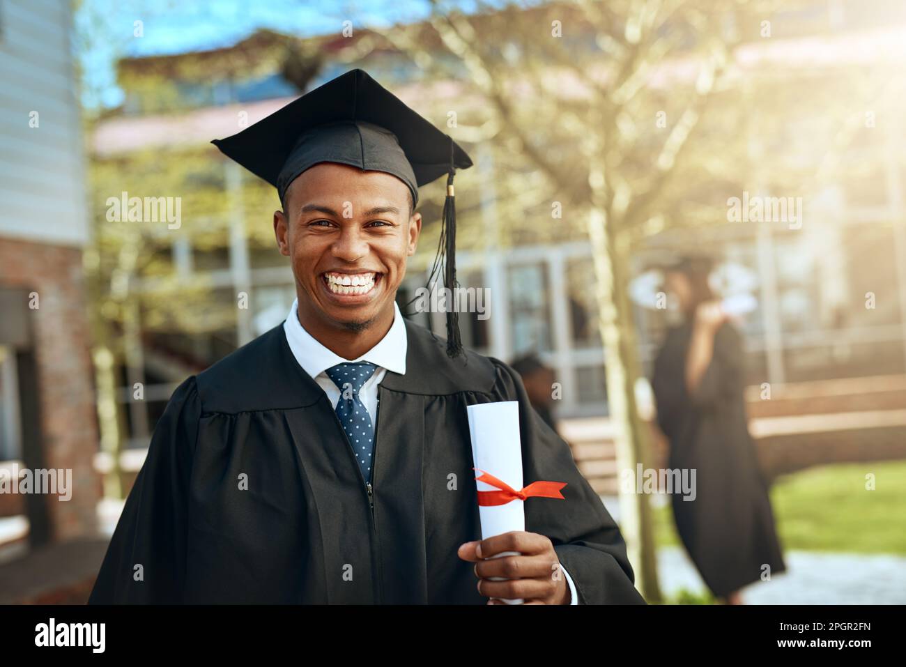 The future sure looks bright from here. Portrait of a happy young man ...