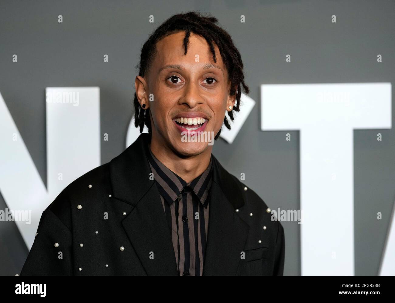 Aaron Branch poses at the premiere of the Netflix series "Unstable ...