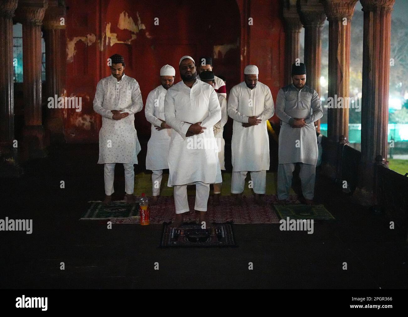 Old Delhi, India. 23rd Mar, 2023. Indian Muslim Men performs their first tarawih special prayer ...