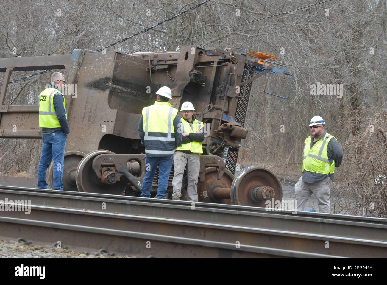 Ayer, Massachusetts, USA. 24th Mar, 2023. Derailed train cars litter ...