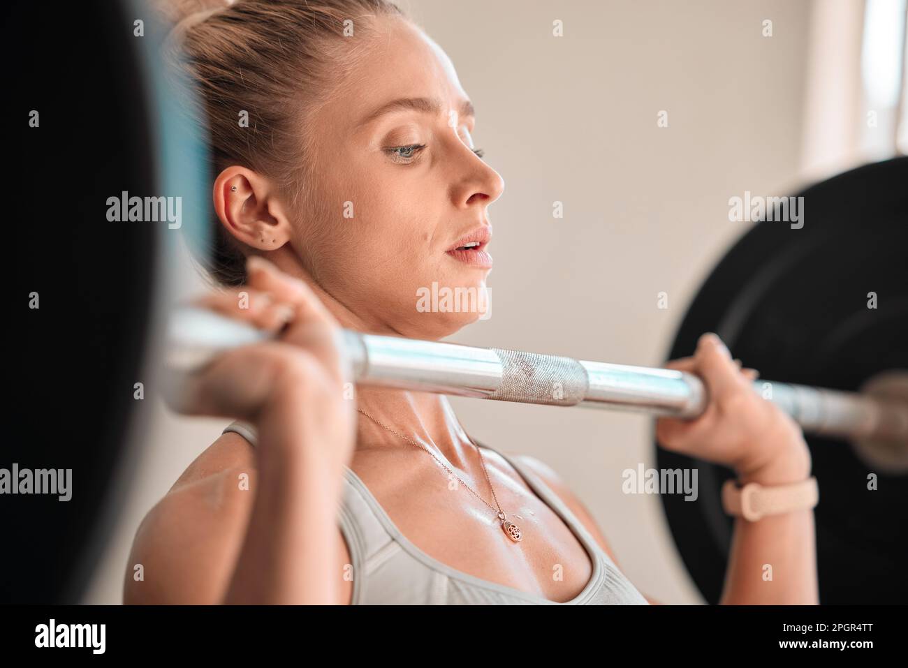 Exercise, weightlifting and a woman bodybuilder in the gym for a ...