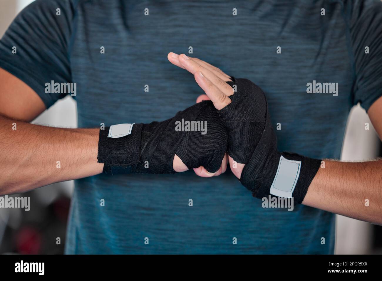 Man, hands and boxing and fitness with martial arts in gym, exercise ...