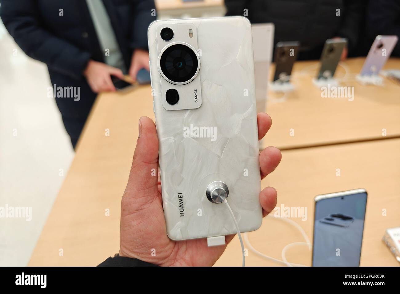 SHANGHAI, CHINA - MARCH 24, 2023 - Customers try Huawei's new P60 and ...