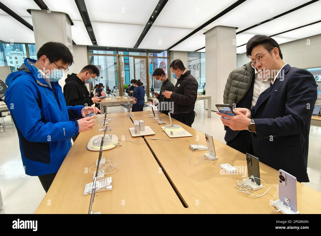 SHANGHAI, CHINA - MARCH 24, 2023 - Customers try Huawei's new P60 and ...