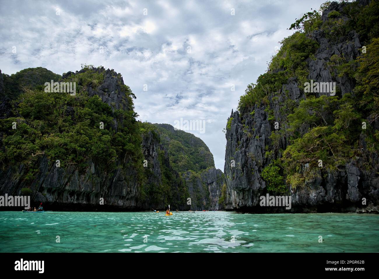 A bay with majestic rocks in El Nido, Palawan in the Philippines that ...