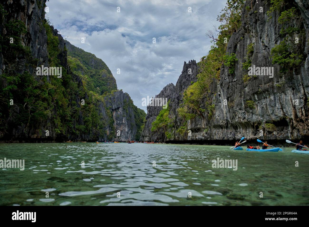 A bay with majestic rocks in El Nido, Palawan in the Philippines that ...