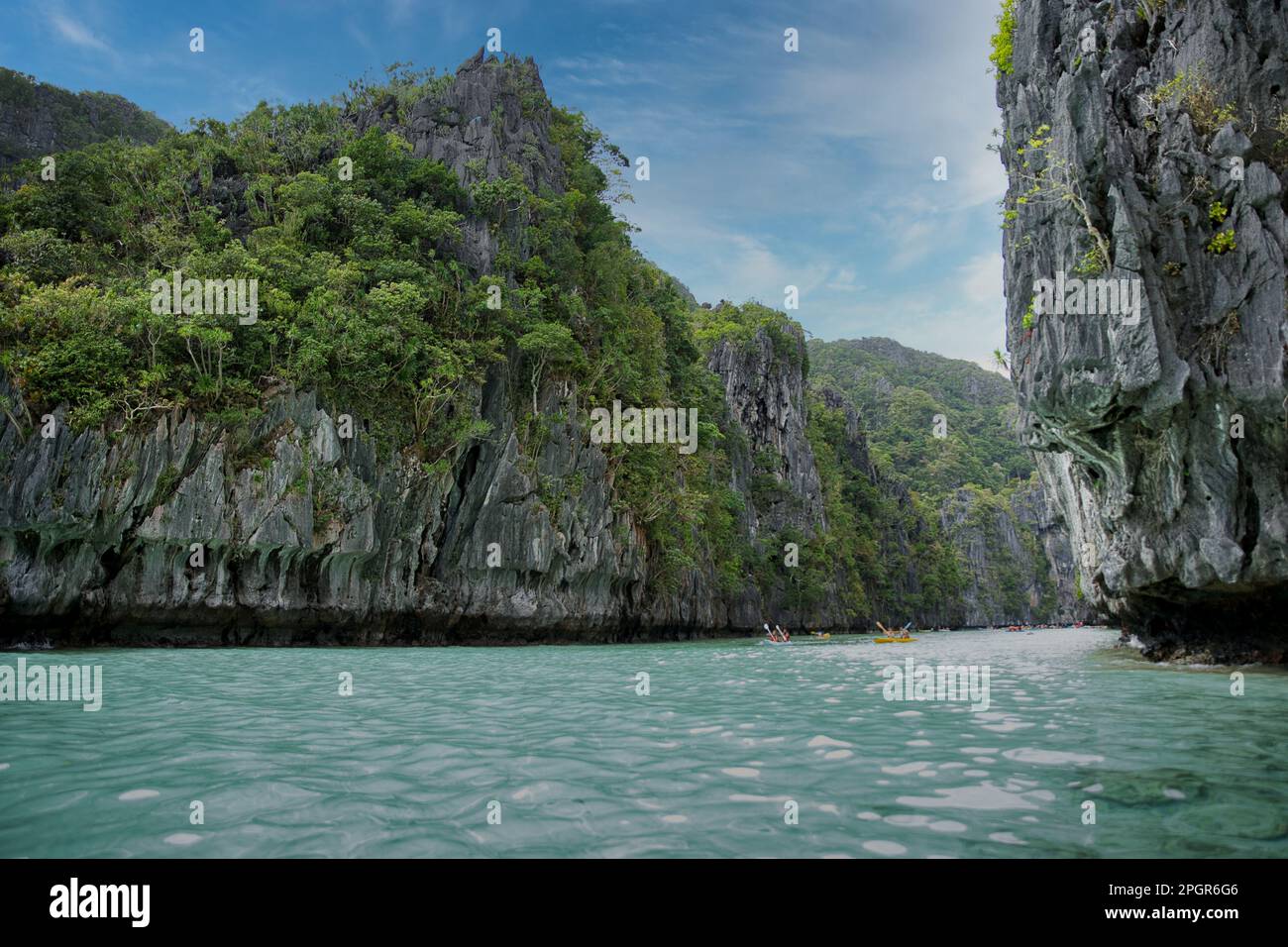 A bay with majestic rocks in El Nido, Palawan in the Philippines that ...