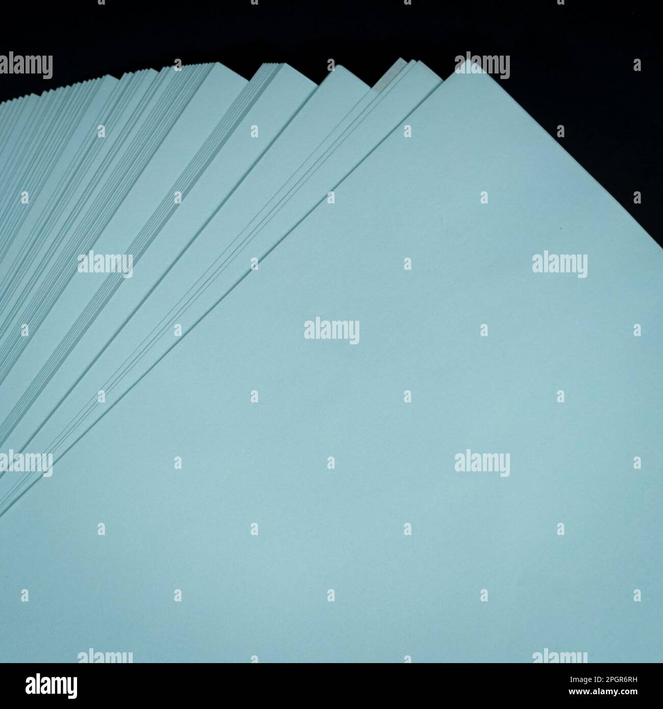 Light Blue Colored Paper. Photo of a stack colored paper Stock Photo ...