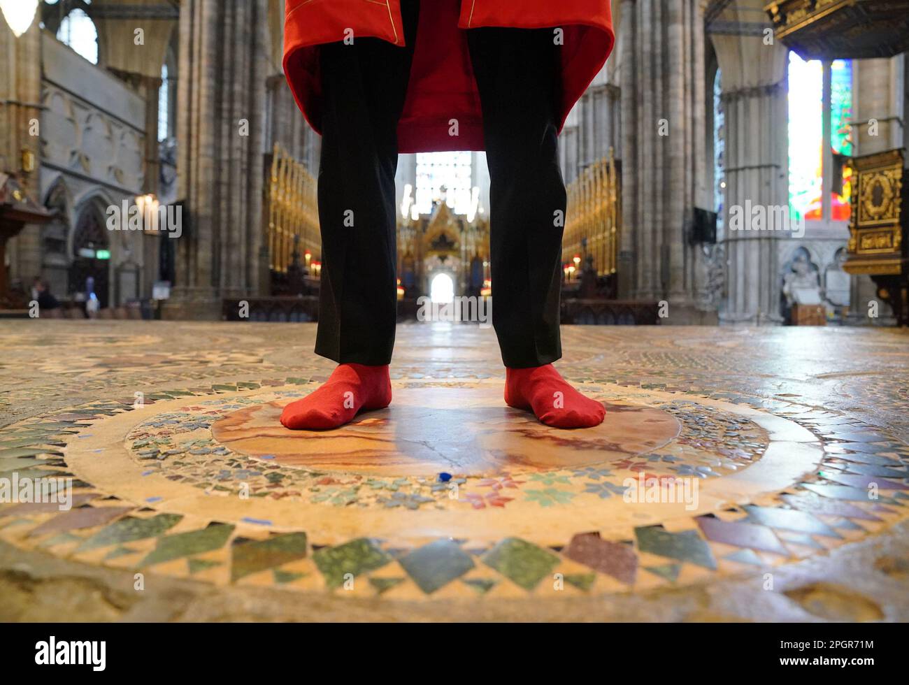 Abbey Marshal Howard Berry stands at the centre of the Cosmati pavement ...