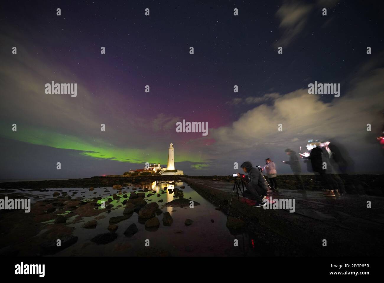 The aurora borealis, also known as the northern lights, glow on the ...