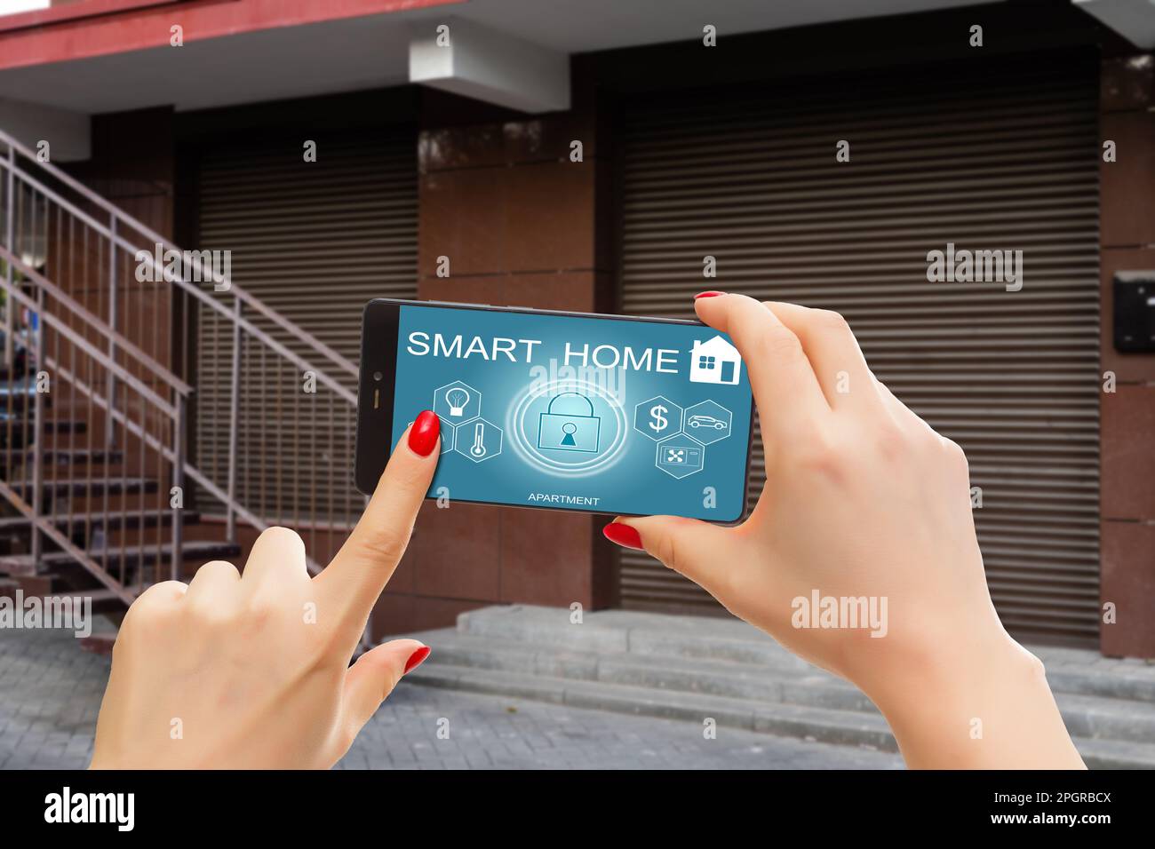 Cropped image of female entering secret key code for getting access and passing building using ...