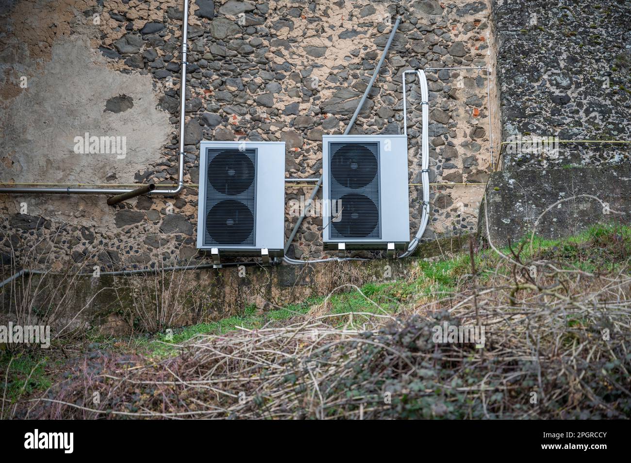 Two modern air conditioner at an old castle wall, Ronneburg Castle ...