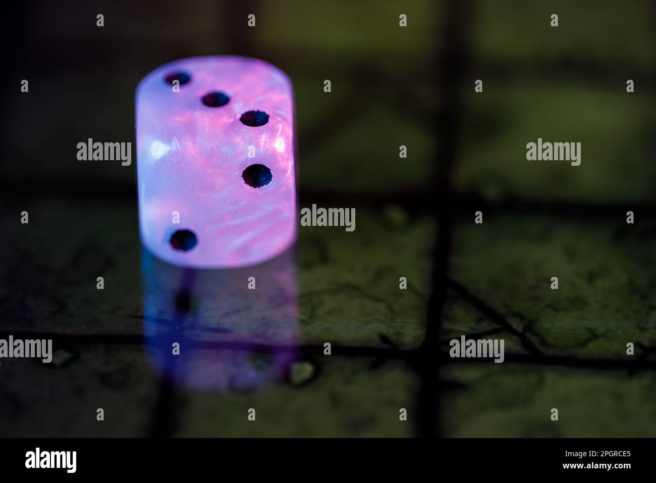 Dice rolling game hi-res stock photography and images - Alamy
