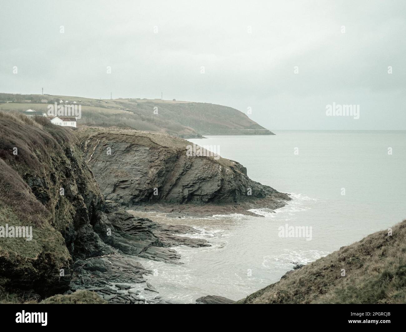 Clouds and rain over the ocean along the Welsh coastal path and ...