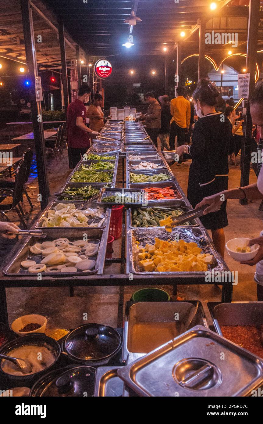 an open-air self service seafood BBQ restaurant during the COVID - 19 ...