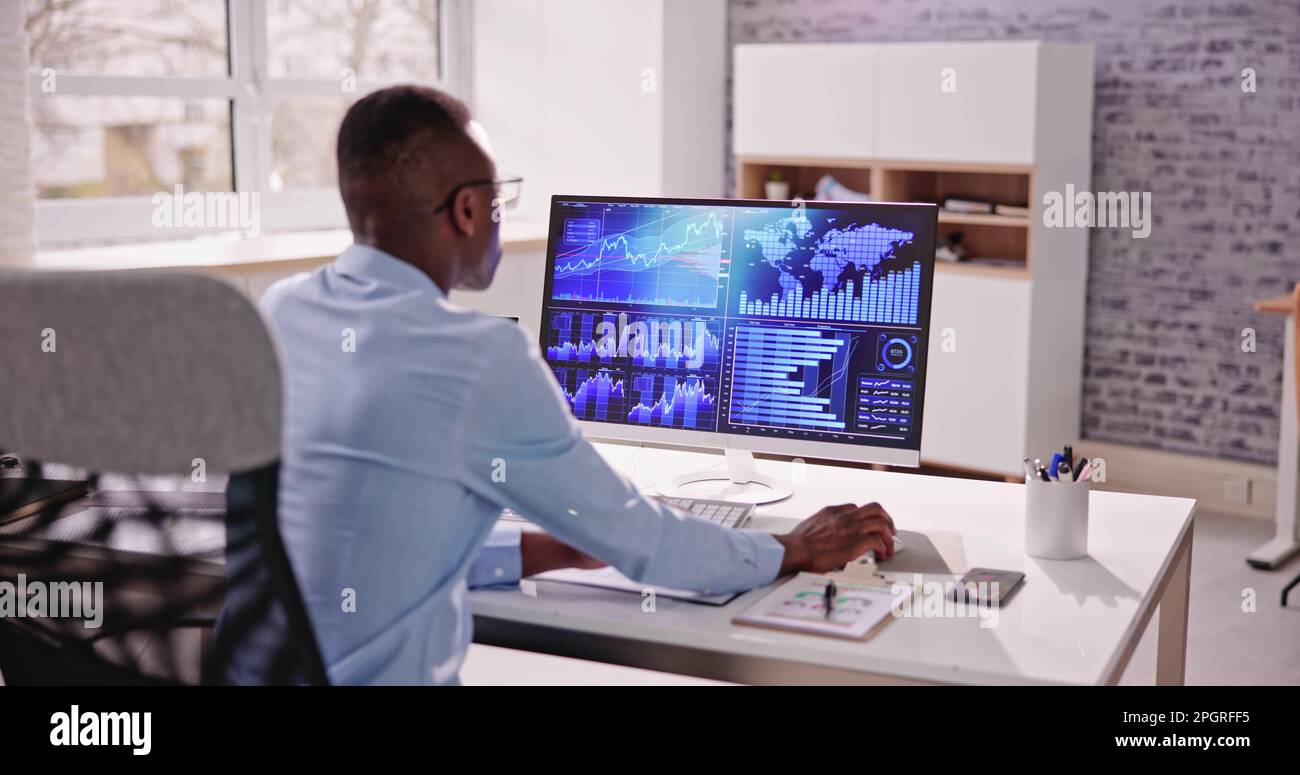 African American Data Analyst Using Data Analytics KPI Dashboard Stock ...