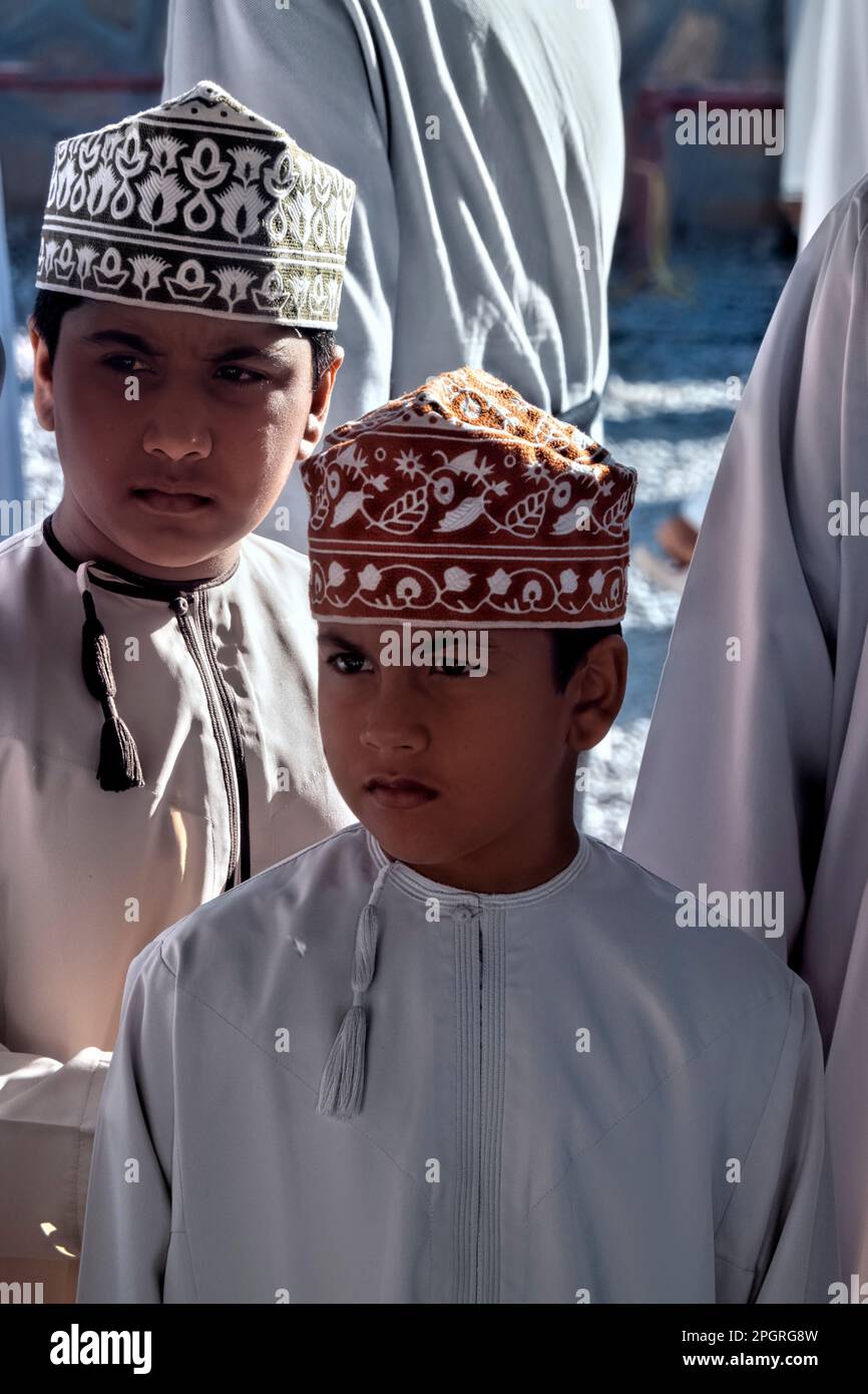 Boys in traditional dress at the Friday goat market, Nizwa, Oman Stock ...