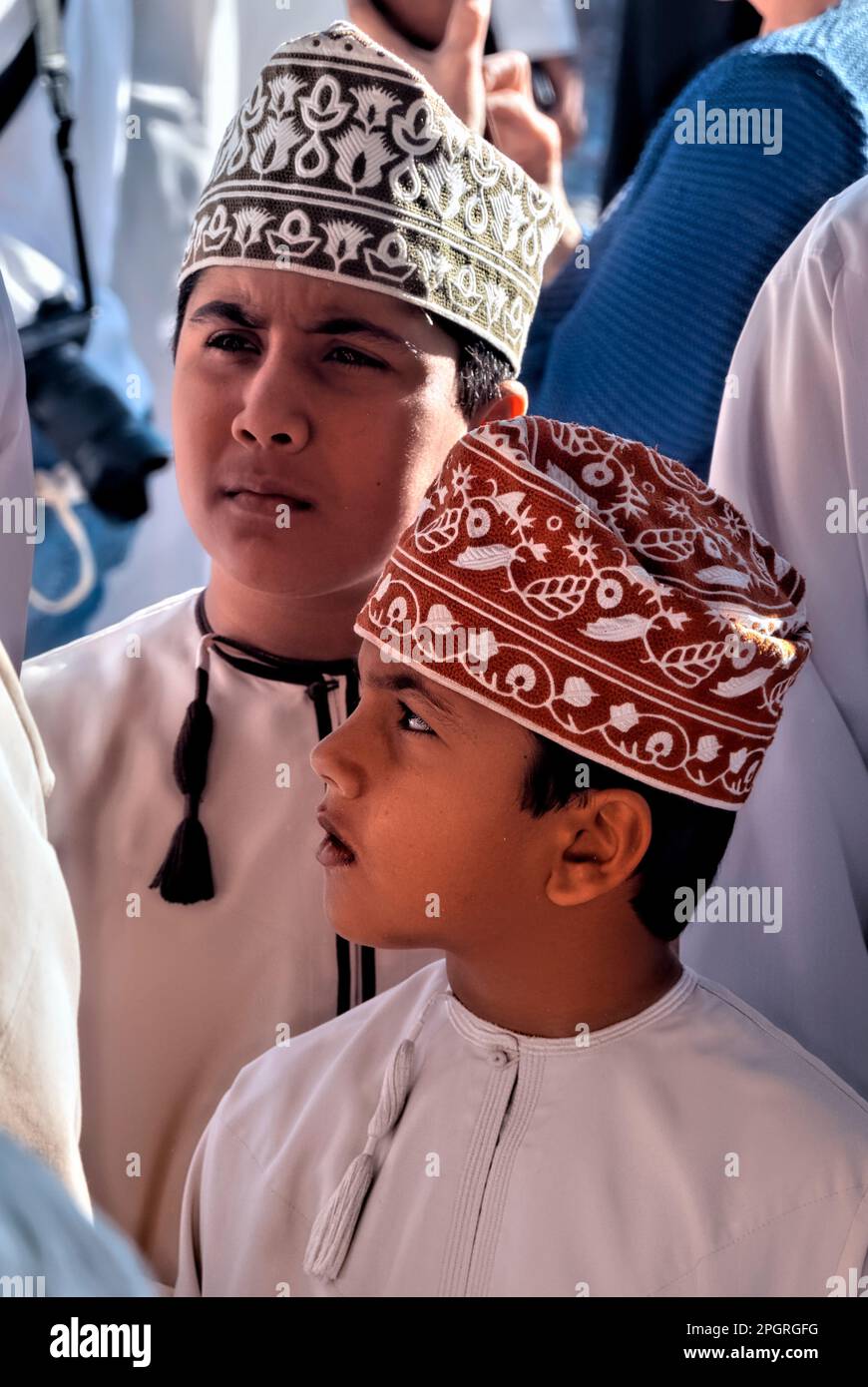 Boys in traditional dress at the Friday goat market, Nizwa, Oman Stock ...