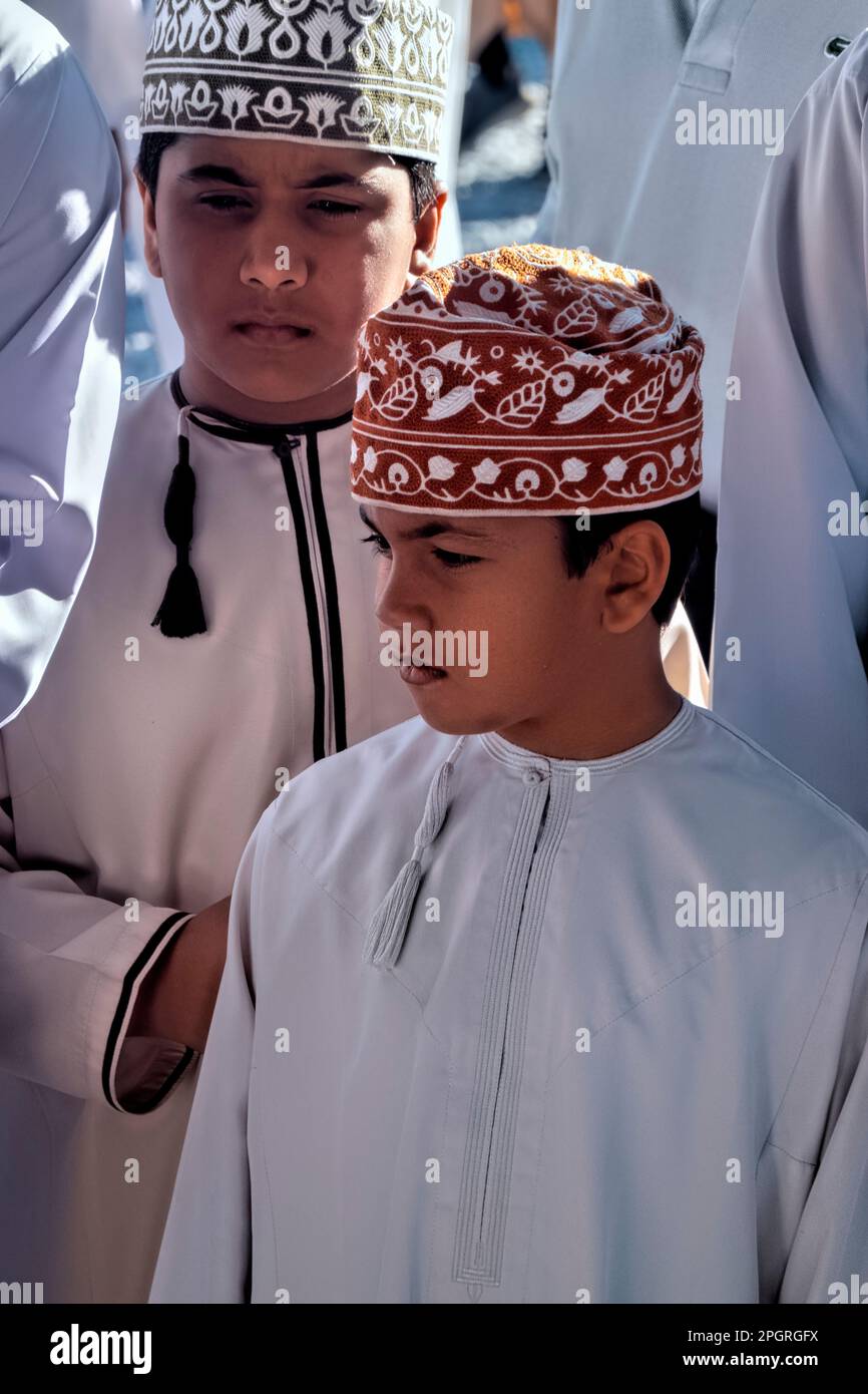 Boys in traditional dress at the Friday goat market, Nizwa, Oman Stock ...