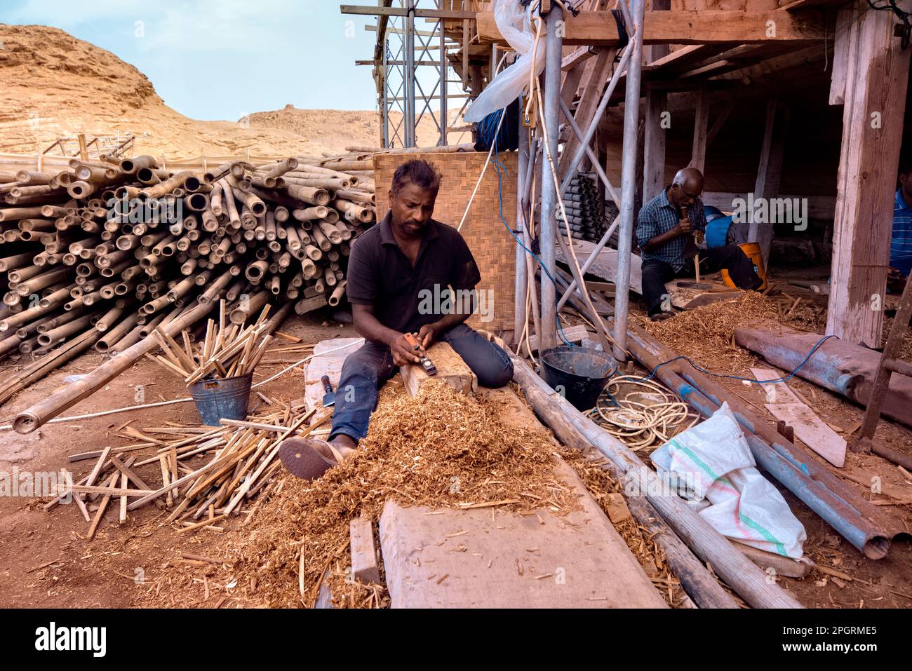 Shipbuilders at the traditional dhow boat factory of Sur, Ash Sharqiyah ...