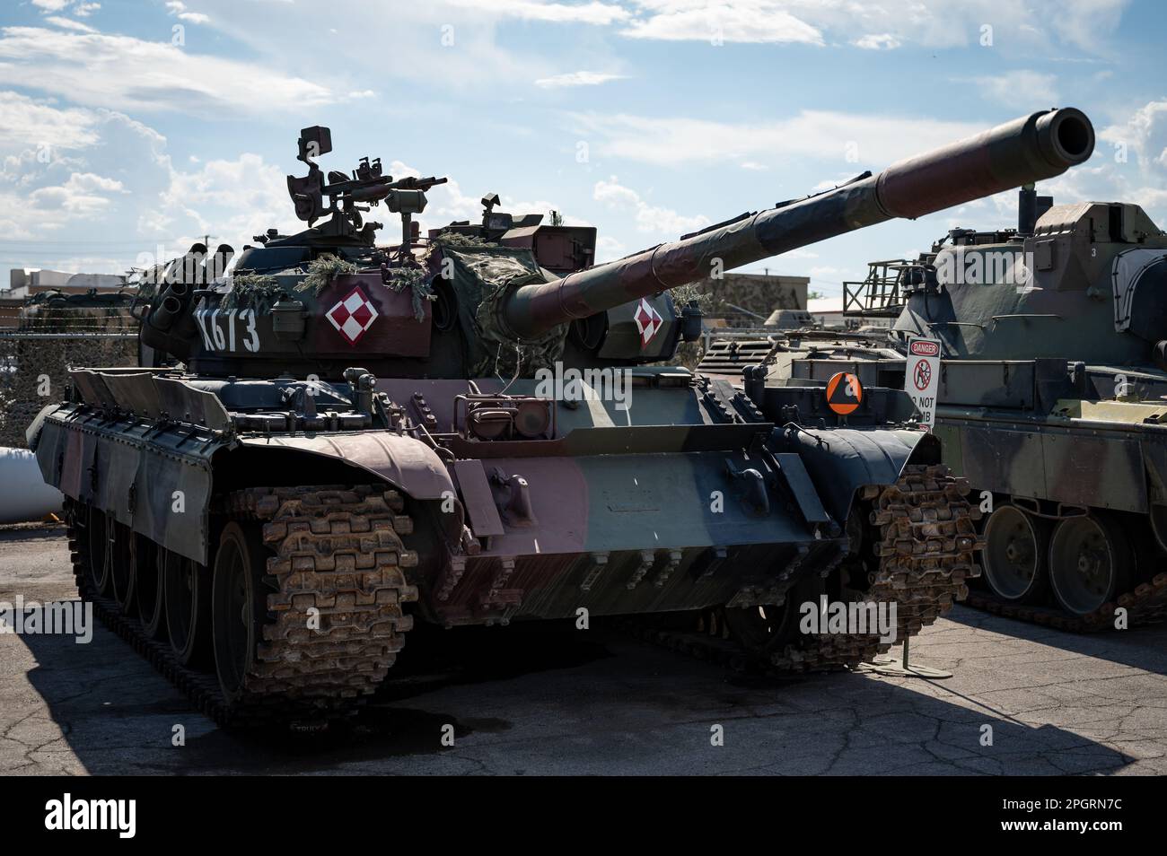 An antique military tank situated in a warehouse Stock Photo - Alamy