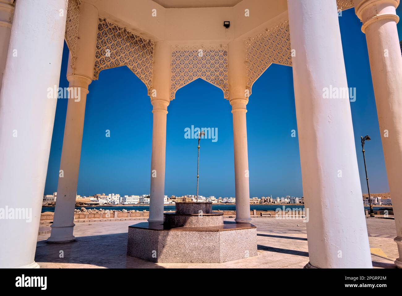 View of whitewashed houses and Al Ayjah lighthouse in Sur, Ash ...
