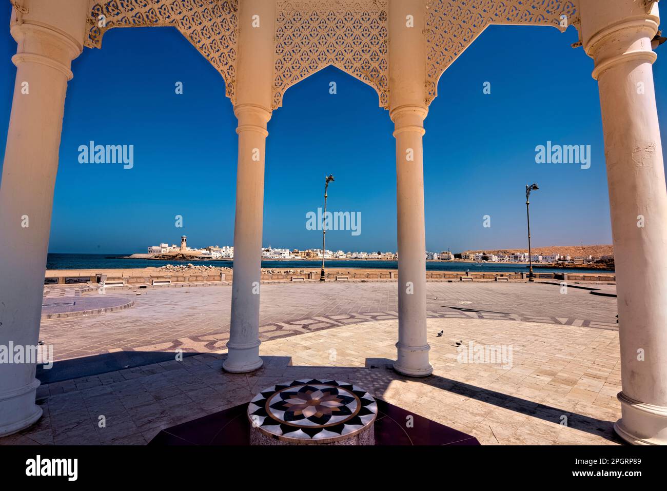 View of whitewashed houses and Al Ayjah lighthouse in Sur, Ash ...
