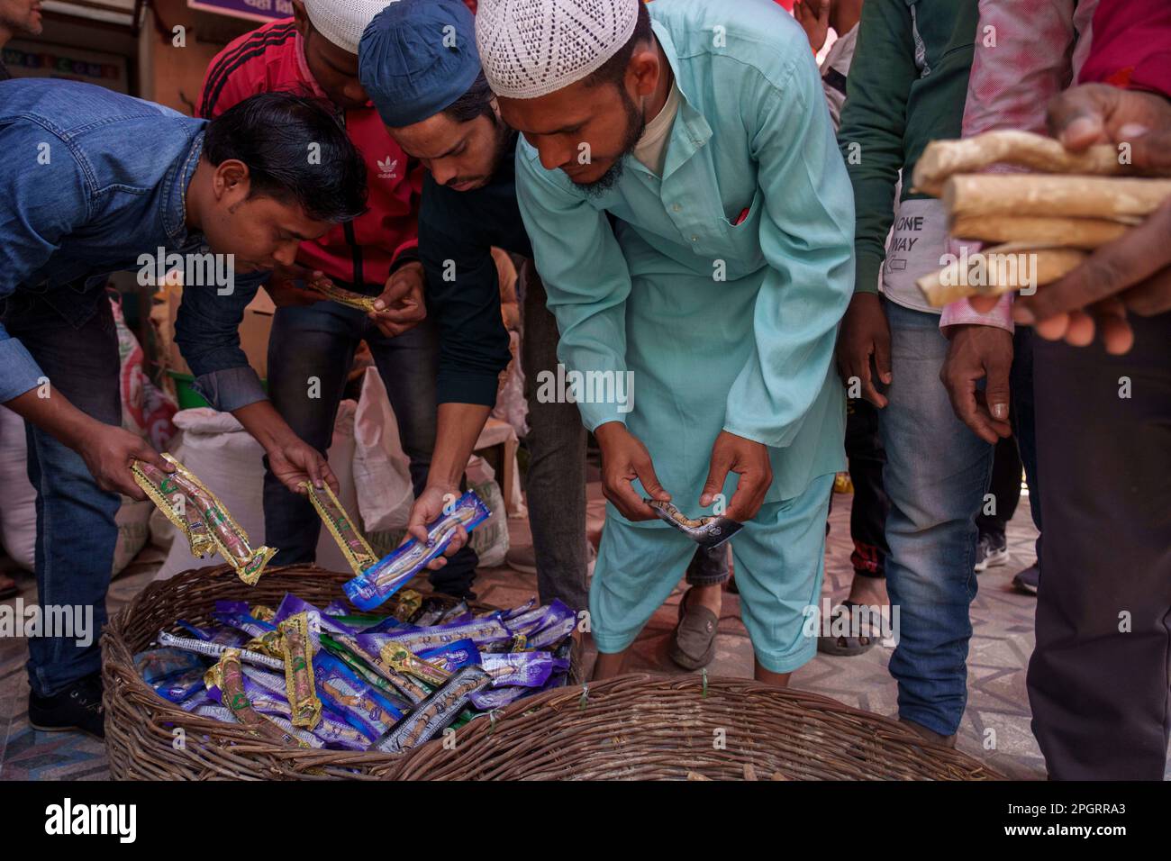 Nepalese Muslims check Miswak, a twig from arak tree used for cleaning ...