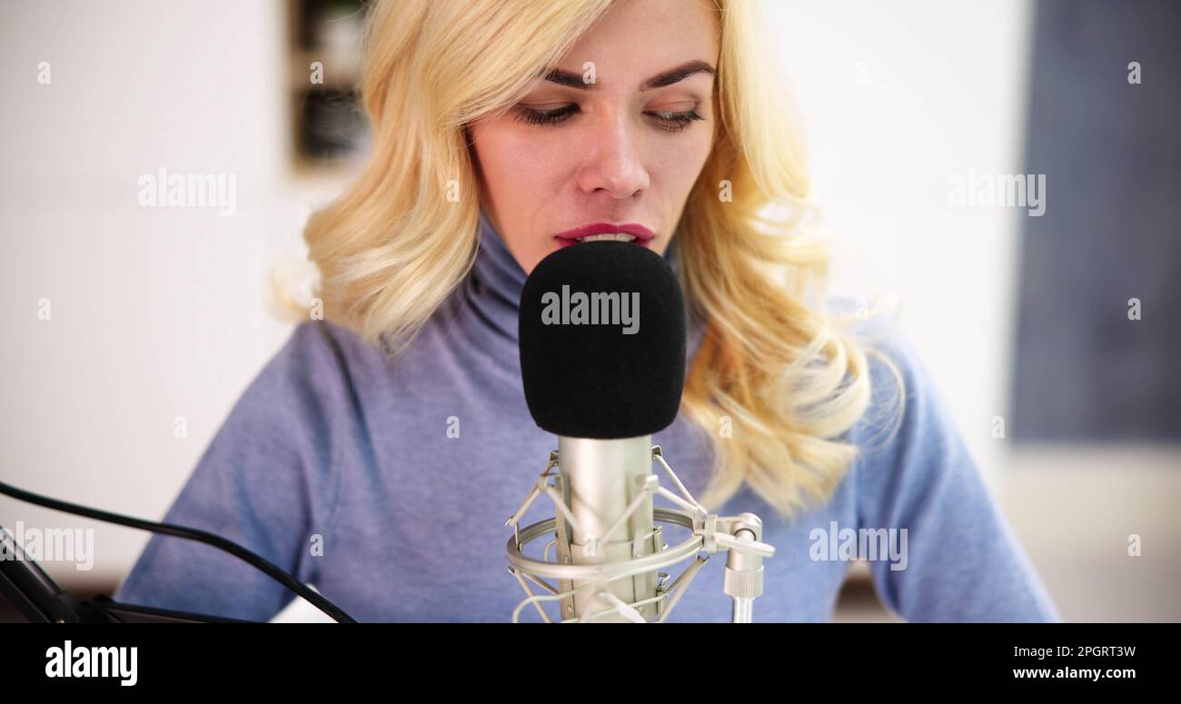 Young Woman Recording ASMR Sounds On Microphone Stock Photo - Alamy