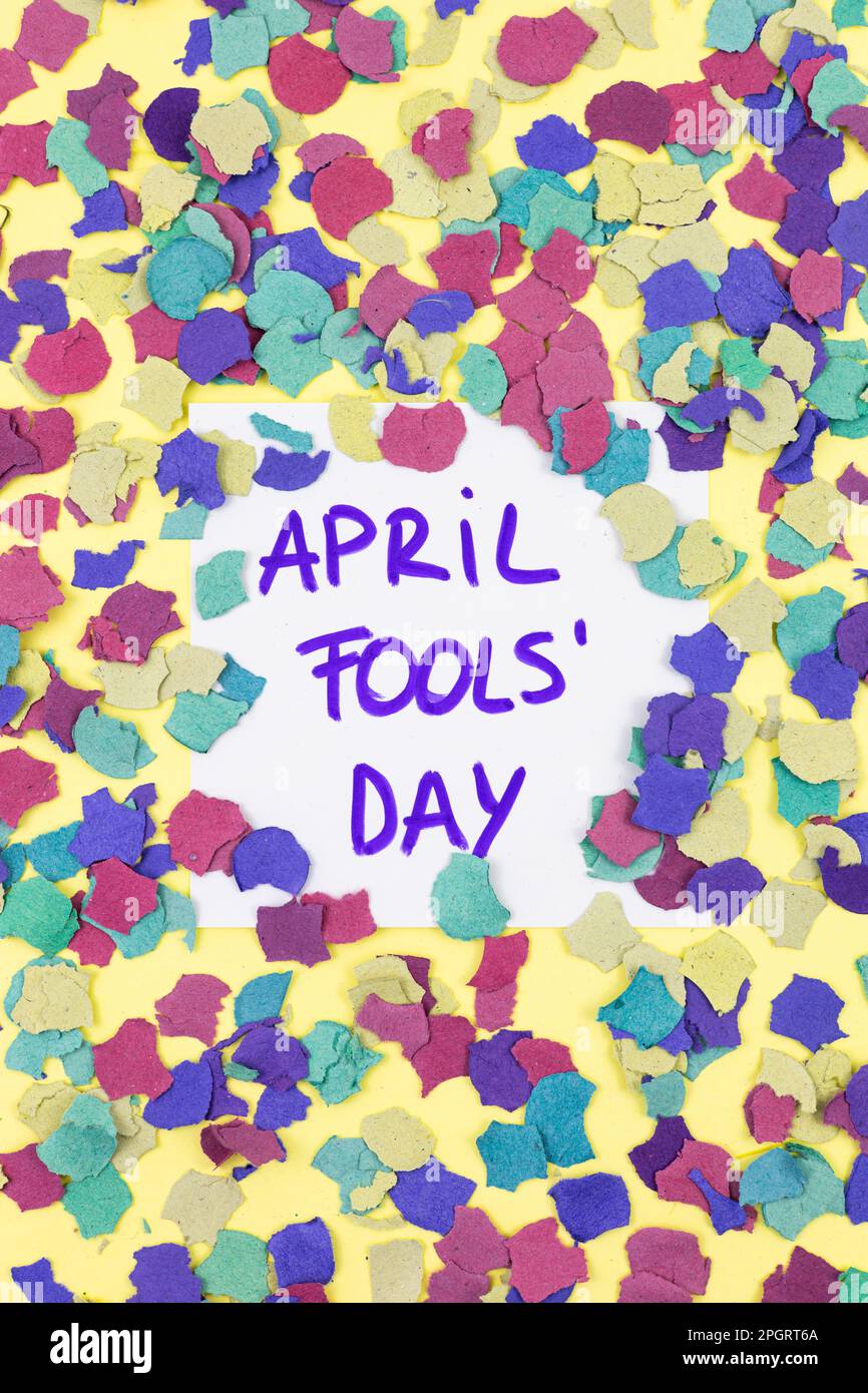 APRIL FOOLS' DAY. Vertical top flat view of April Fools Text in sticker ...