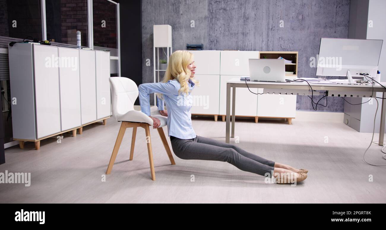 Chair Office Dip Exercise Triceps Dips At Desk Stock Photo - Alamy