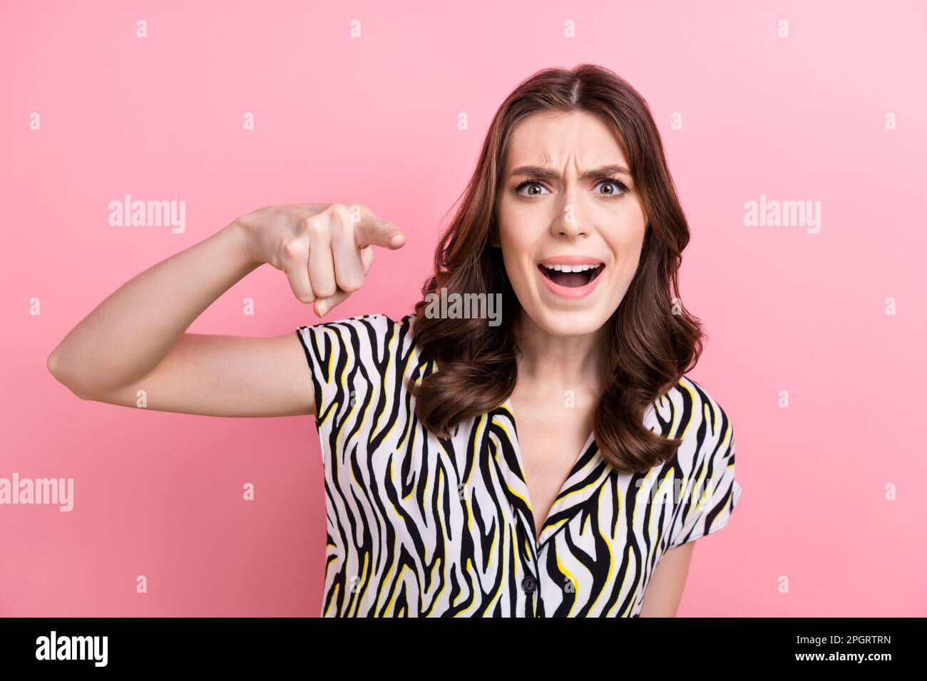 Photo of unsatisfied outraged girl speak scream point finger camera ...