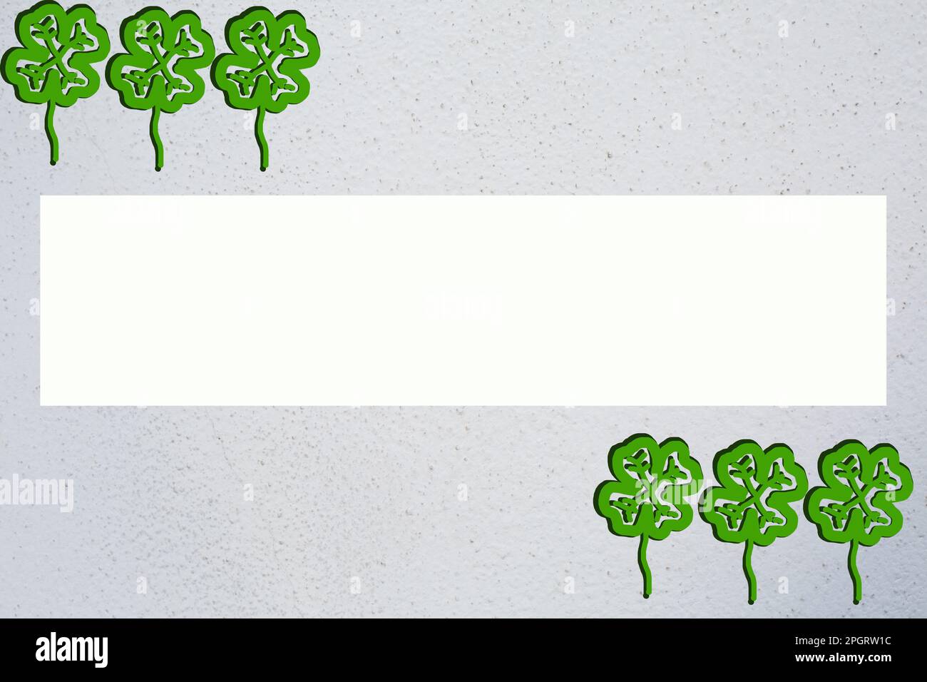 Picture of three green quatrefoils in upper left and down right corner ...