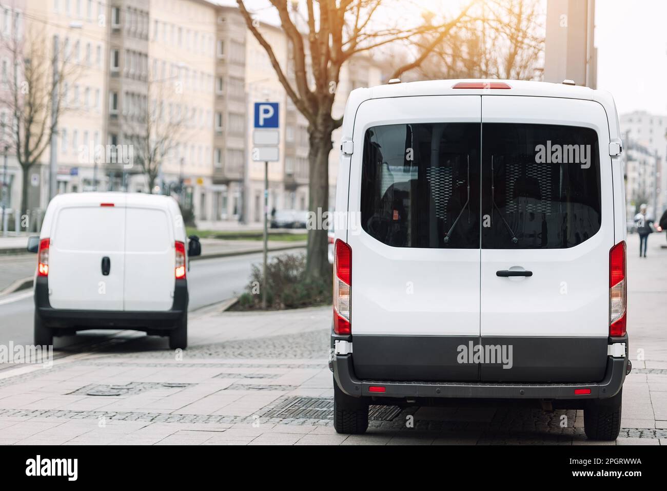 Small cargo delivery van parked in european city central district ...