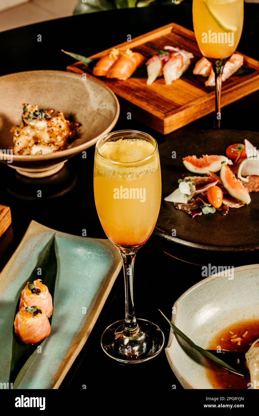 A dining table set with dinnerware and food for a meal Stock Photo - Alamy