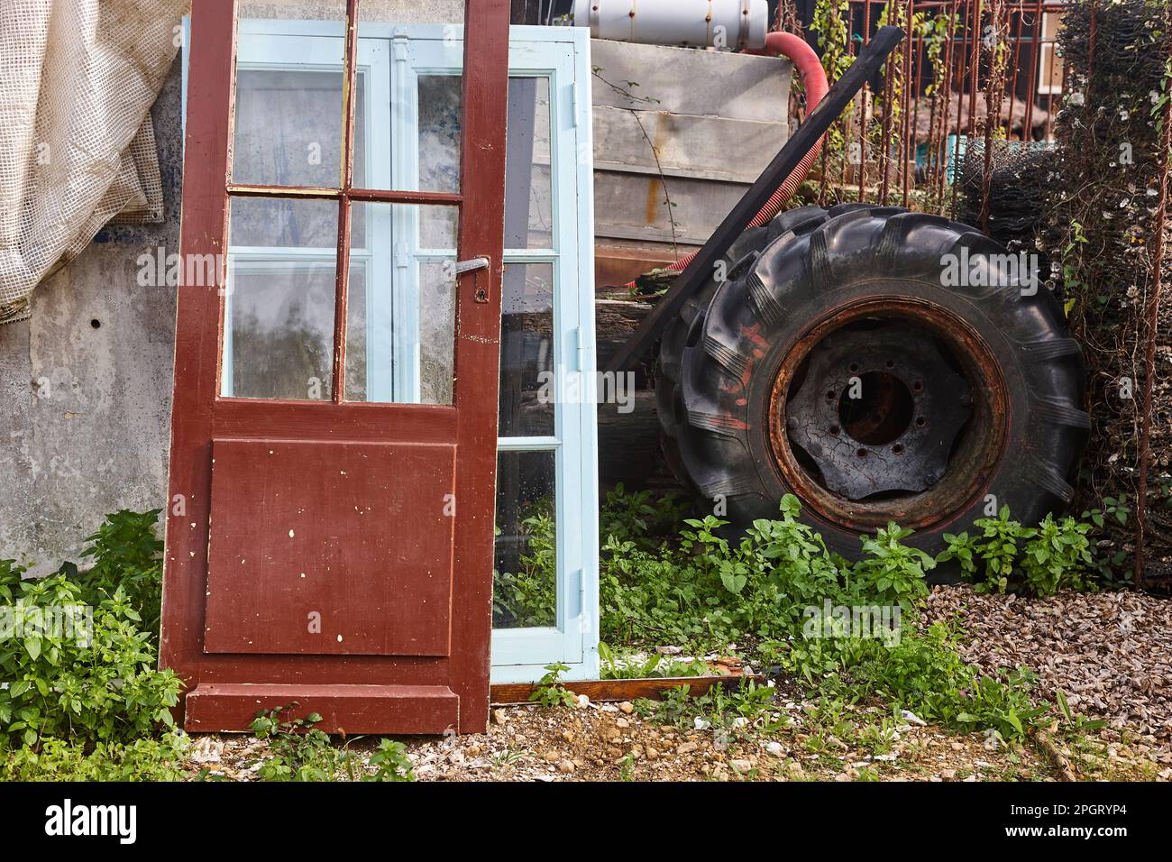 Debris garbage in the courtyard. Environment damage. Abandoned objects ...