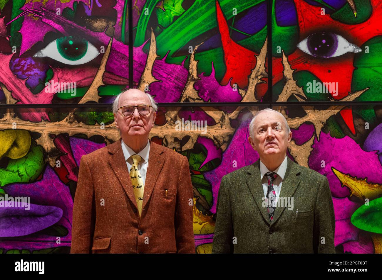 London, UK. 24 March 2023. Artists Gilbert & George, in front of 'Lion ...