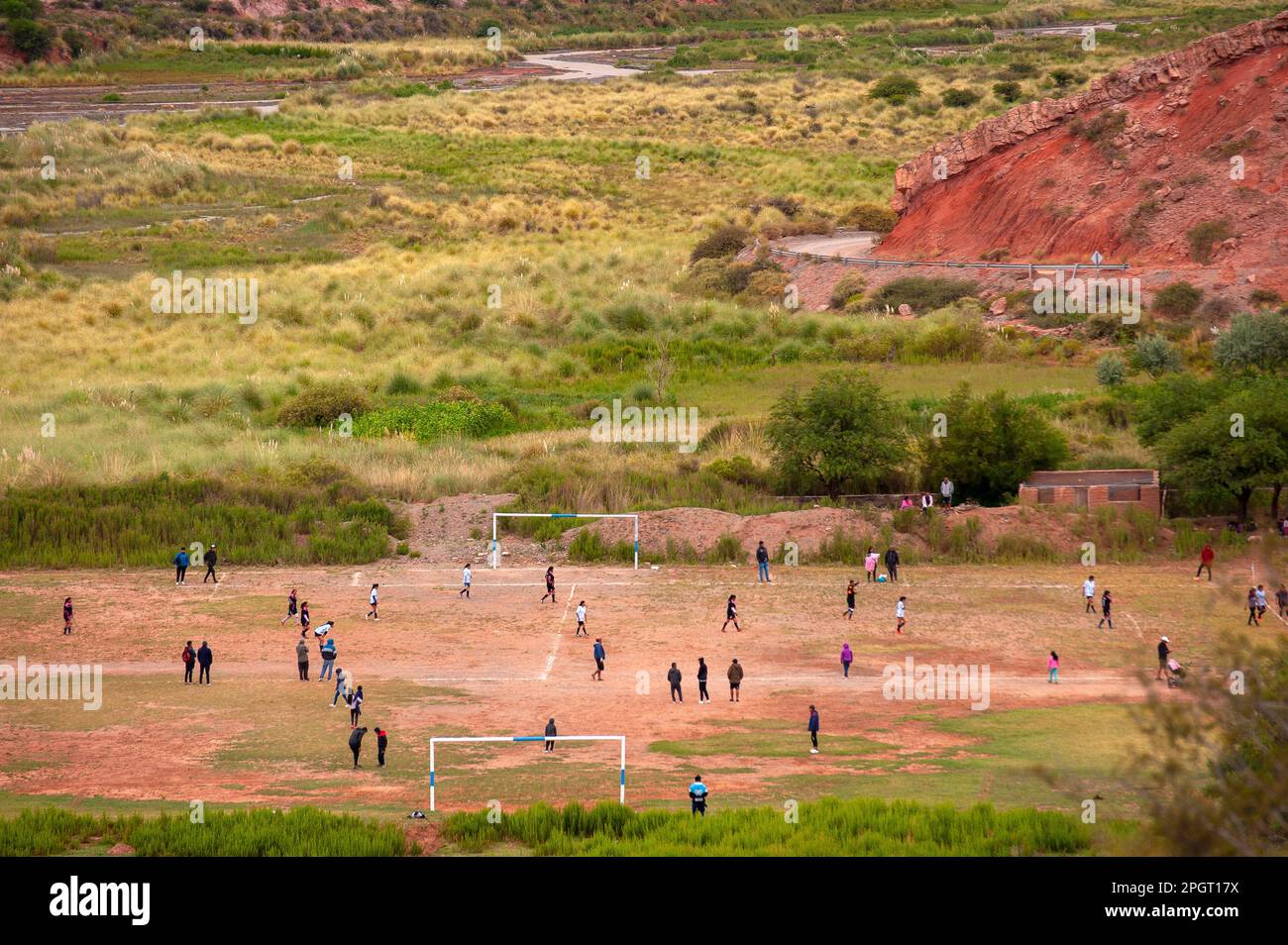 Students trainning football at the football field Nehuen Iglesias ...