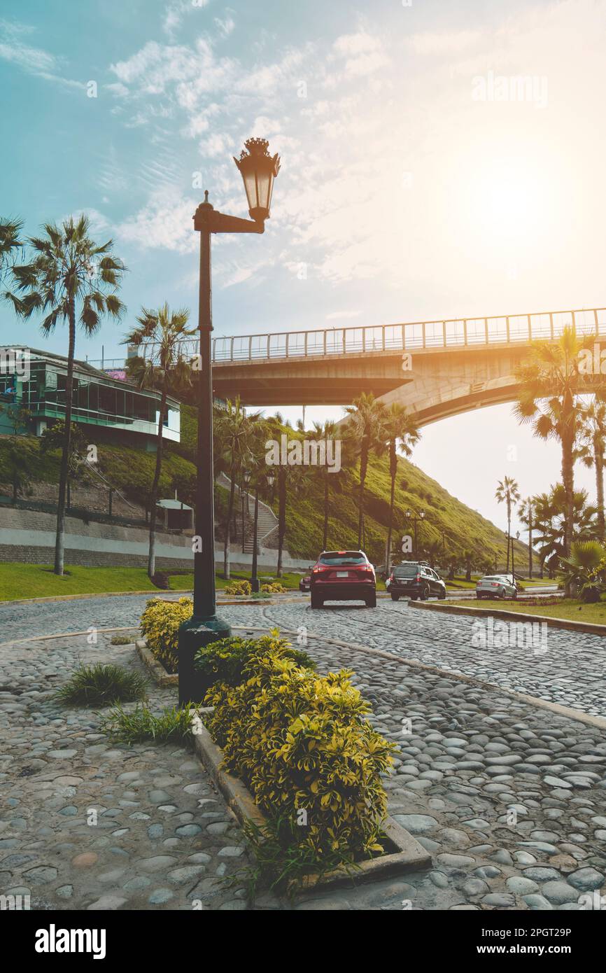 Sunset view from La Bajada de Balta in Miraflores, in the city of Lima ...